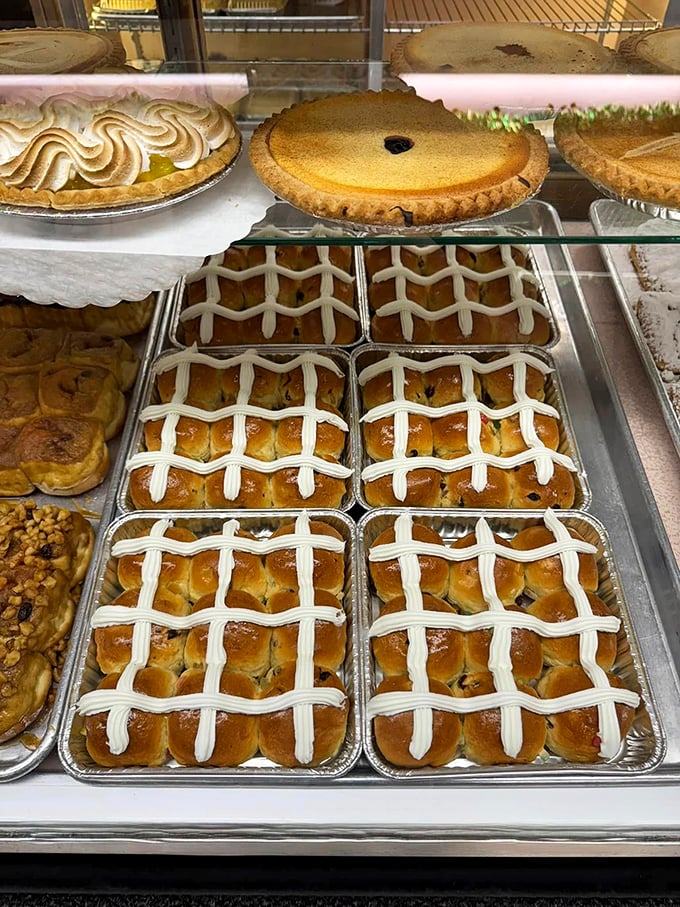 Hot cross buns lined up like they're auditioning for Easter's greatest hits album.