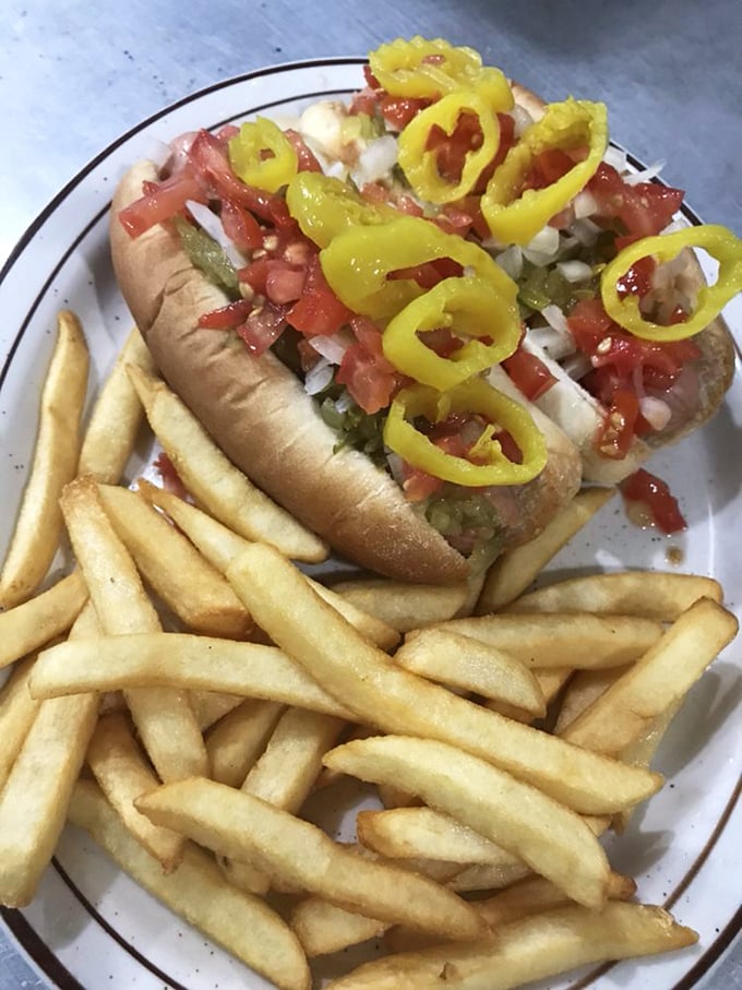 A hot dog dressed for success with more toppings than a sundae bar—proof that lunch at a breakfast joint isn't settling.