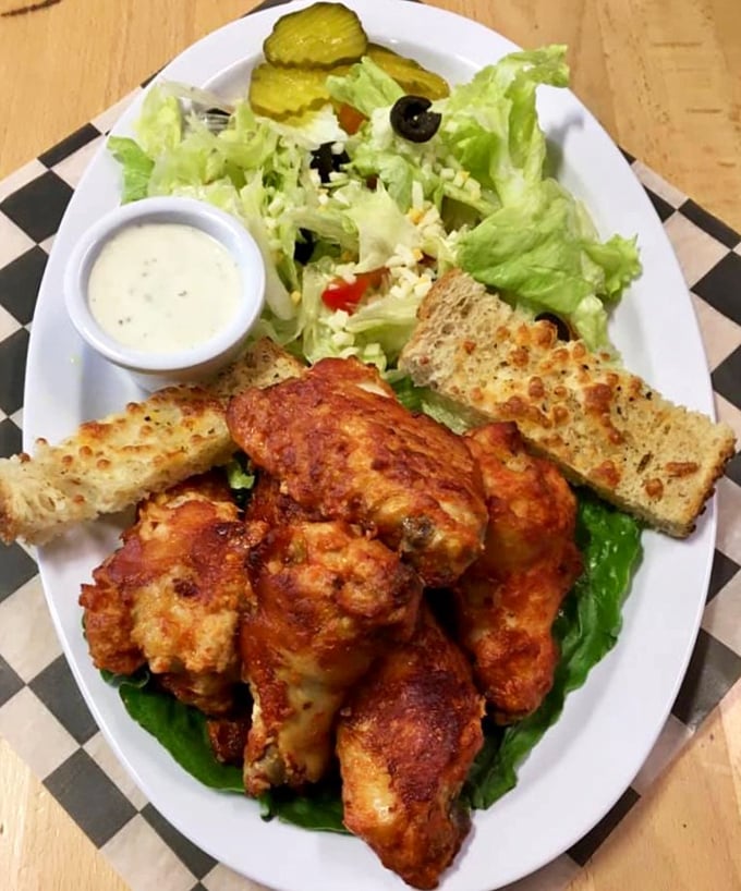 These wings aren't just hot—they're life-affirming. Served with a side salad to maintain the illusion that you're making healthy choices.