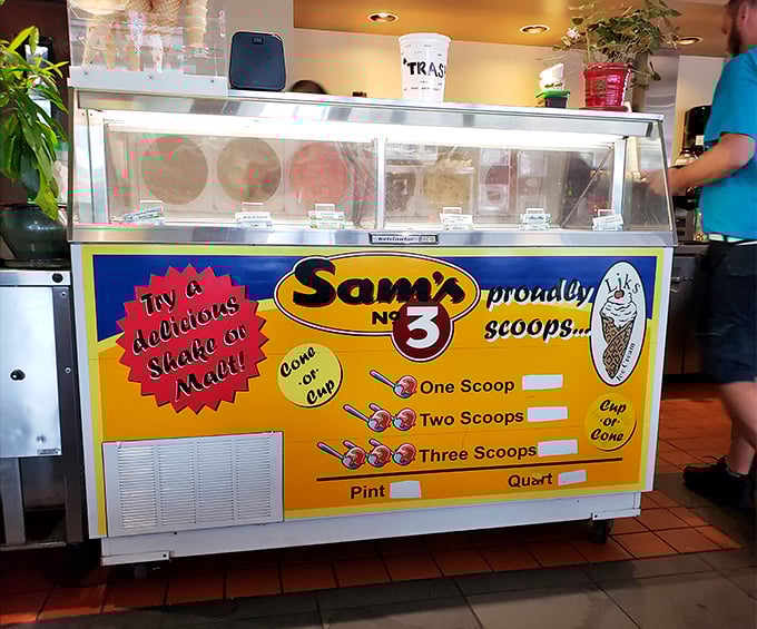 The ice cream counter promises sweet salvation after your savory feast. One scoop is never enough when you're living your best diner life.