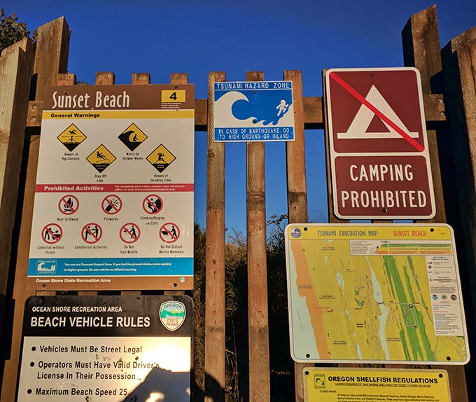 The fine print of paradise – these signs outline the rules of beach etiquette and safety for this pristine stretch of coastline.