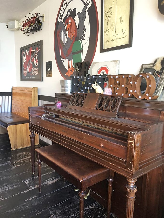 Every great BBQ joint needs a piano—for when your taste buds break into song. The "BBQ" marquee lights up like Broadway for meat.