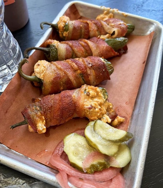 Jalapeño poppers wrapped in bacon – because everything's better with bacon, especially things that are already perfect.
