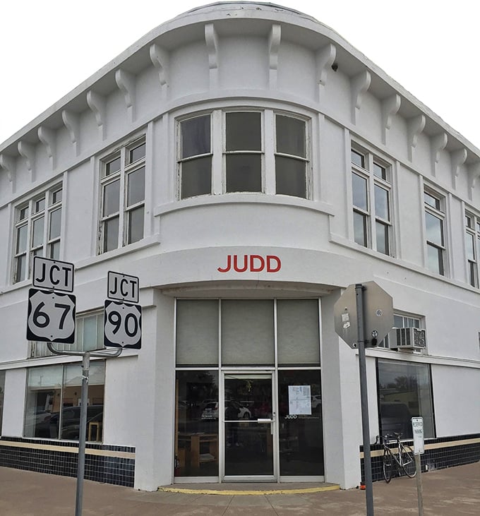 The Judd Foundation building stands at the crossroads of Highways 67 and 90—much like Marfa itself.