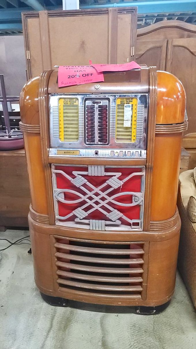 This isn't just a jukebox—it's the soundtrack to someone's first kiss, wrapped in honey-colored wood and nostalgia. Currently 20% off memories.