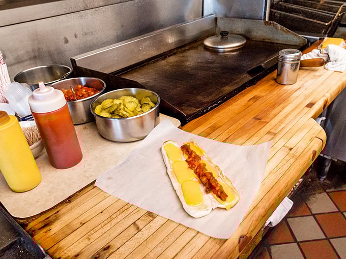 Behind the scenes, the well-seasoned grill and prep station reveal where the magic happens—simple ingredients transformed by experience.