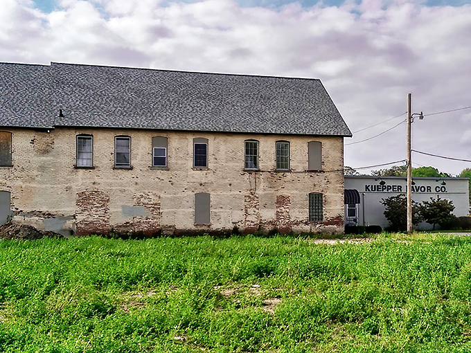 History wears its age honestly at the old Kuepper Favor building, where weathered bricks tell stories of Peru's industrial past.
