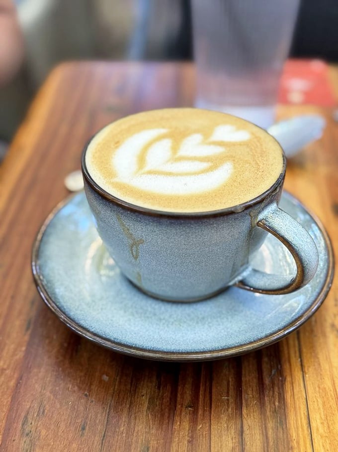 Latte art so pretty you almost don't want to drink it—almost. The velvety foam creates a canvas too delicious to resist.