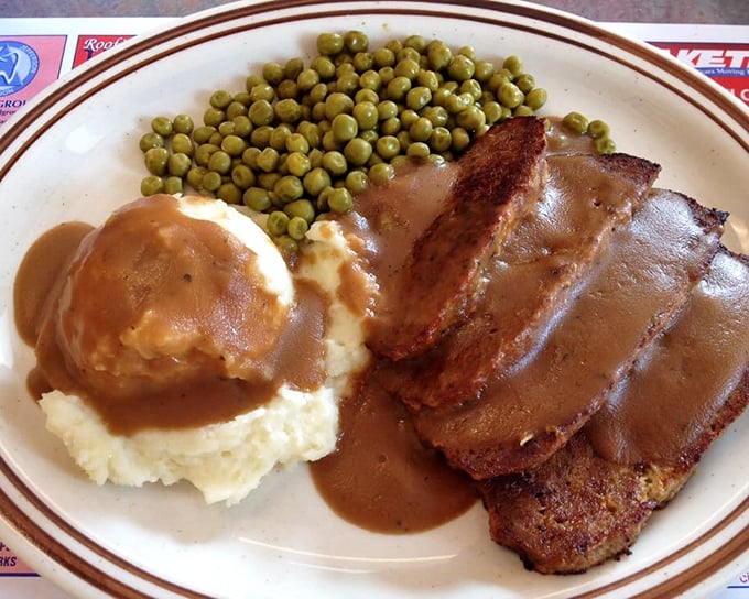 Meatloaf and mashed potatoes—the dynamic duo of comfort food. The gravy ties everything together like a well-written final act.