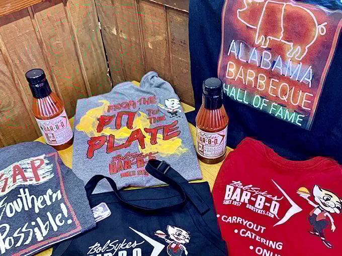 Merchandise that lets you take the BBQ spirit home. That "From the Pit to the Plate" shirt is basically formal wear in Alabama.
