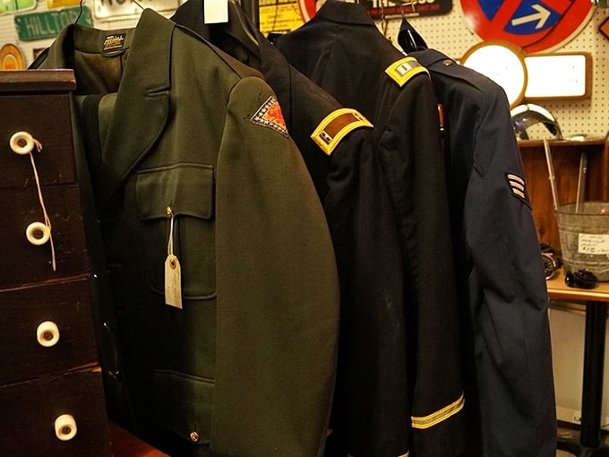 Military uniforms stand at attention, representing service and sacrifice. These aren't just clothes—they're chapters of American history.