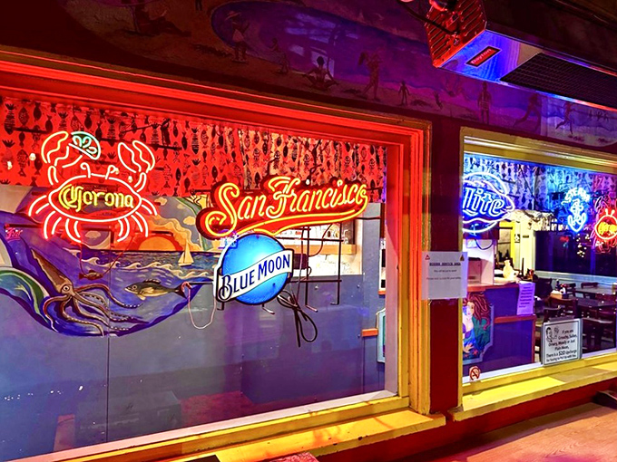 The neon signs cast a warm glow, promising cold beer and fresh seafood—two promises Barbara's Fishtrap always keeps.
