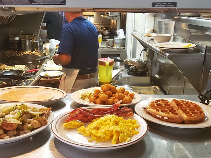The kitchen ballet where spatulas dance and orders sing – culinary theater at its finest.