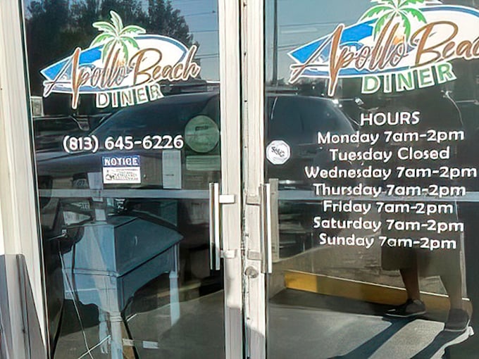 Hours posted clearly on the door—the roadmap to breakfast bliss. Tuesday closure means the staff gets a well-deserved break from making everyone else's day better.