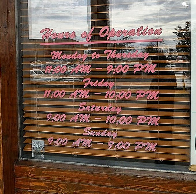 Hours of operation posted like a promise—the buffet equivalent of "we'll leave the light on for you."