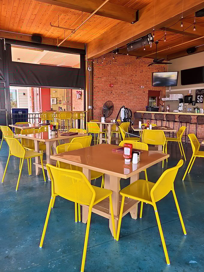 Those yellow chairs pop like sunshine – perfect for people-watching while you wait for takeout perfection.