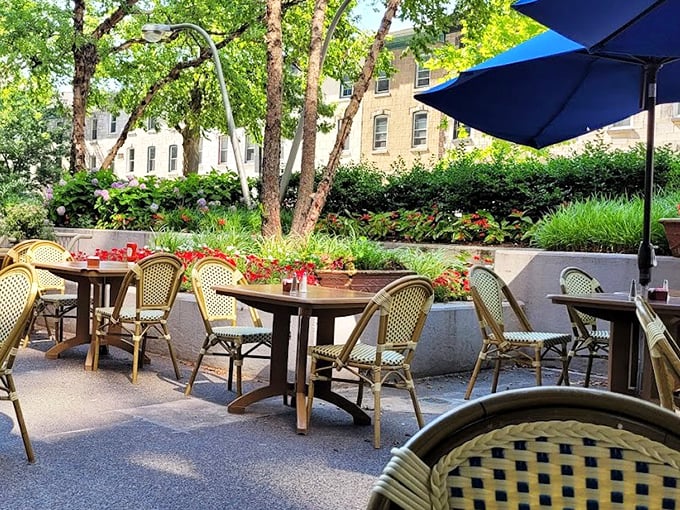 The outdoor patio offers urban tranquility—a perfect setting for people-watching while debating whether to order dessert. (Hint: always yes)