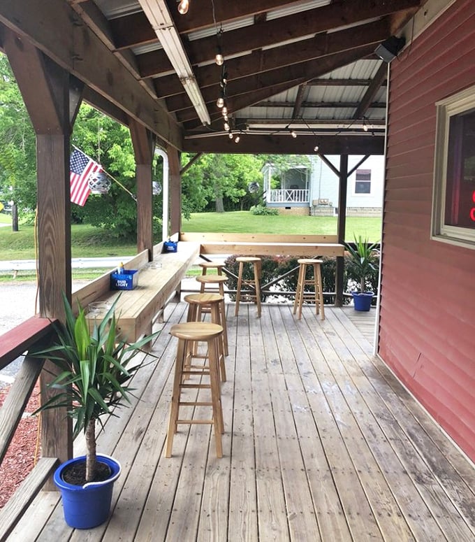 The covered porch offers al fresco dining with a side of small-town charm—perfect for those summer evenings when indoors feels criminal.