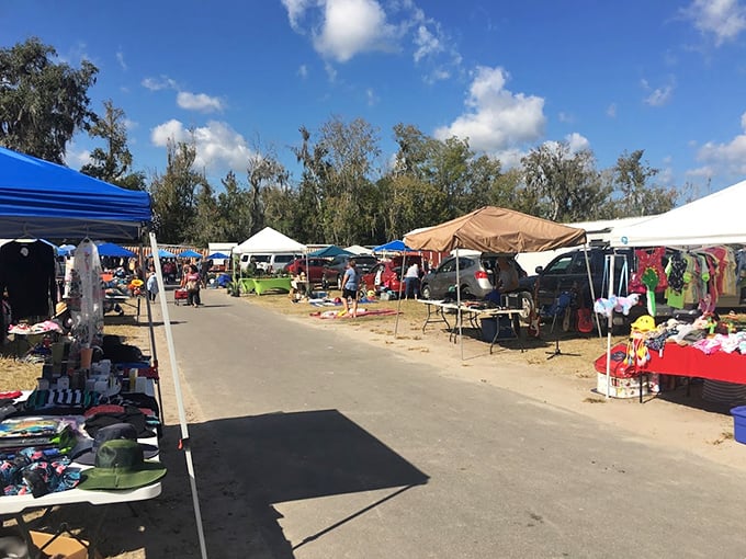 The universal language of bargain hunting translates perfectly under these tents. Some people meditate—others find their zen haggling over vintage fishing lures.