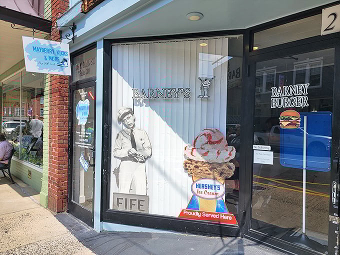 Window art that tells you everything – Barney Fife watches over ice cream dreams and burger fantasies on Main Street.