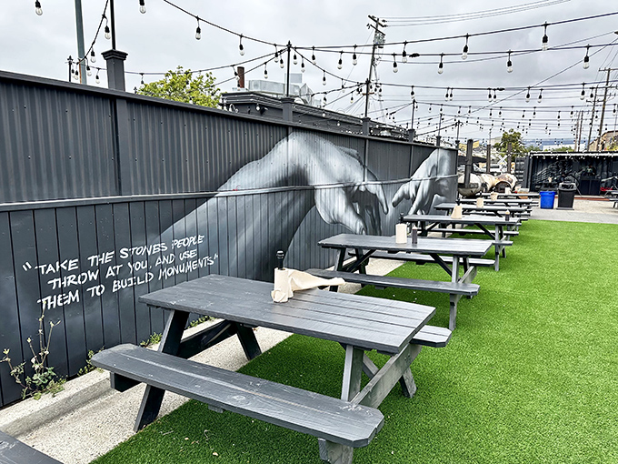 "Take the stones people throw at you, and use them to build monuments"—outdoor dining with inspiration and string lights to match the stellar food.