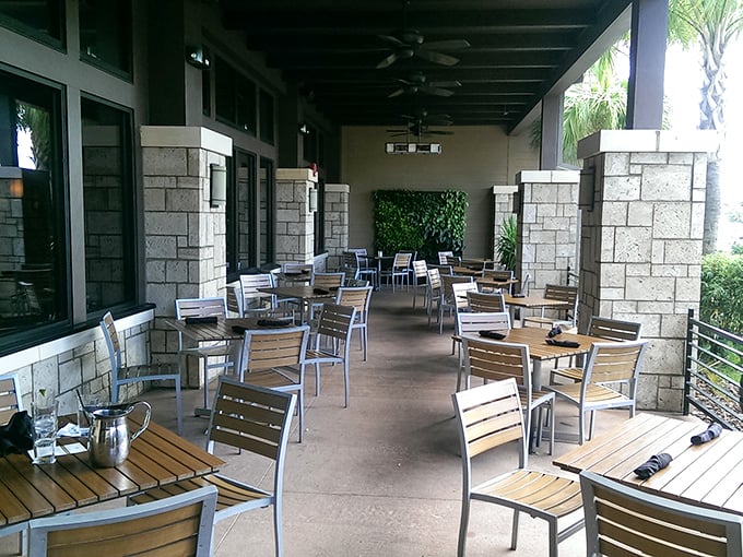 The outdoor seating area offers a respite from Orlando's theme park madness. A place where adults can sip and savor while palm trees sway.