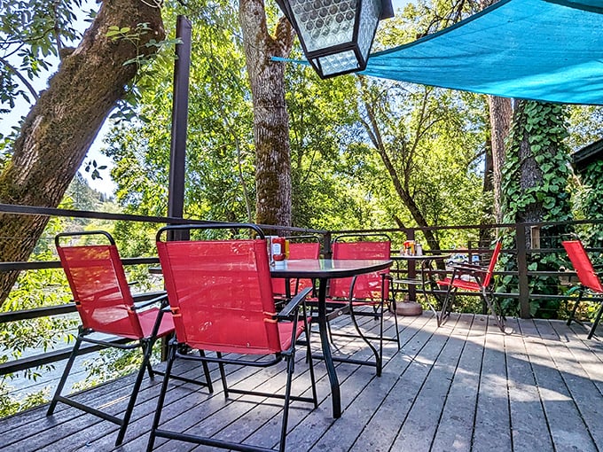 Outdoor dining that puts Mother Nature on the payroll. Those red chairs aren't just comfortable—they're front-row seats to Oregon's greatest show: the great outdoors.
