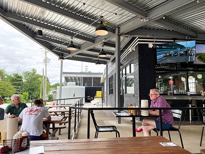 Outdoor seating that strikes the perfect balance between casual and comfortable – where barbecue meets fresh air under Carolina skies.