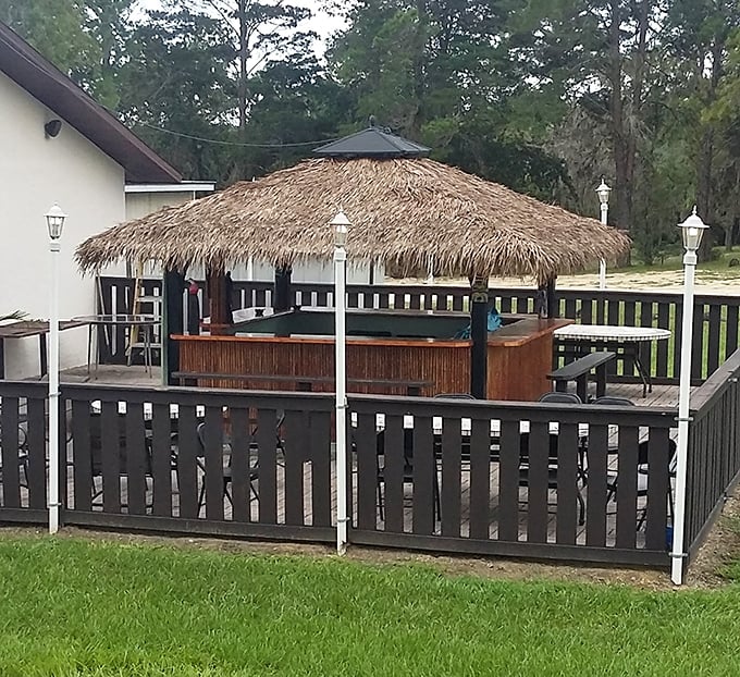 The tiki-style outdoor seating area—Florida's answer to the question "How can we make eating barbecue even more vacation-like?"