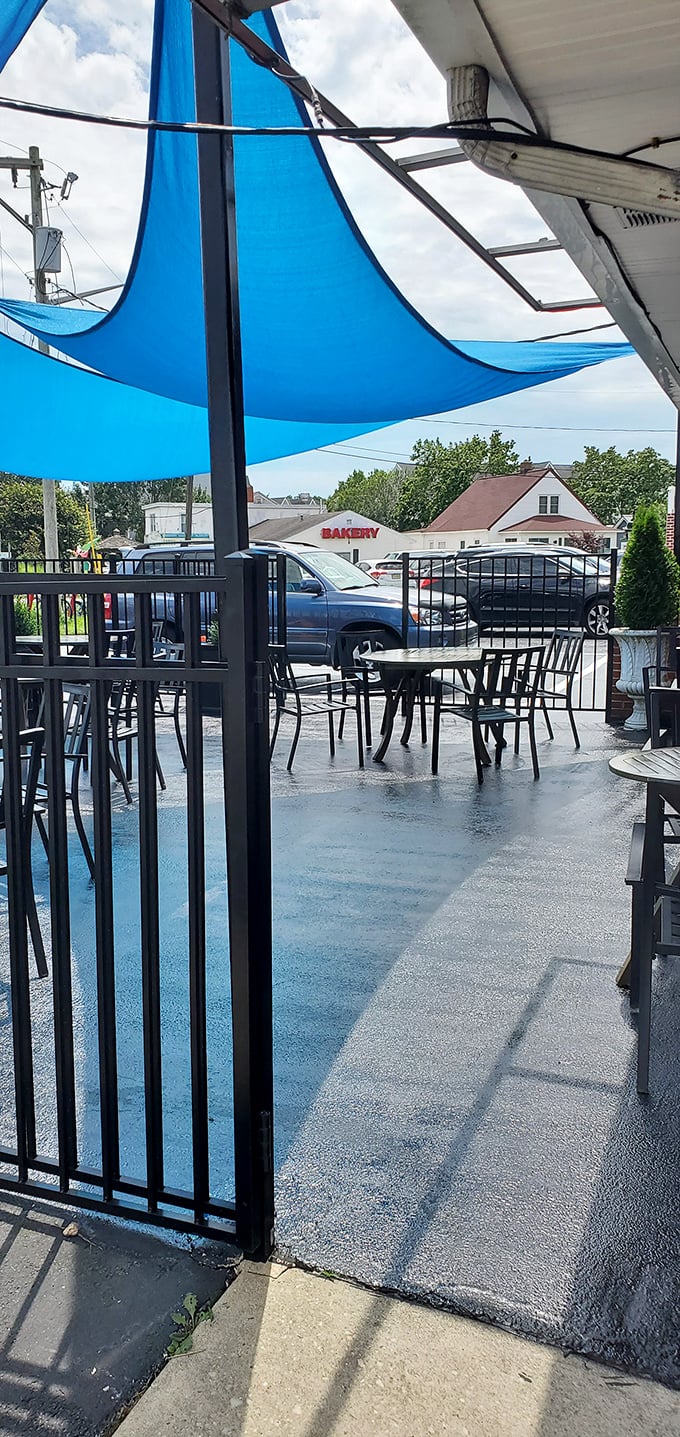 The outdoor seating area offers a glimpse of small-town life passing by – the perfect backdrop for coffee and conversation on a Delaware morning.