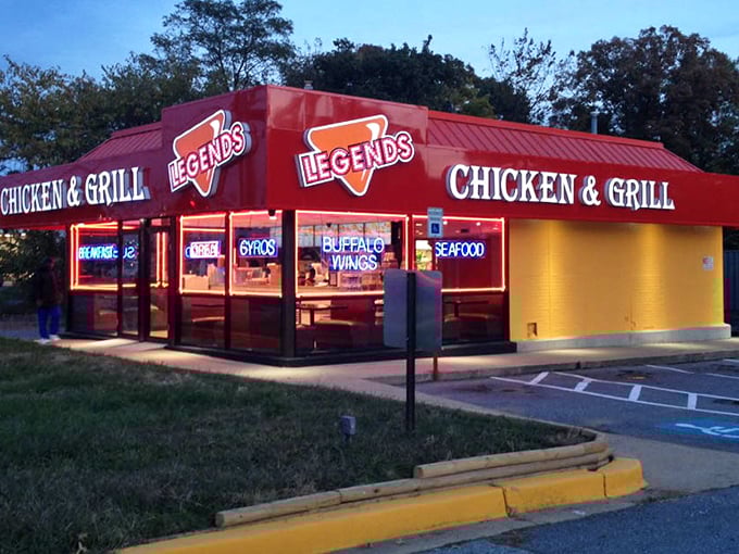 As dusk falls, Legends transforms into a glowing chicken oasis, beckoning hungry travelers from miles around.