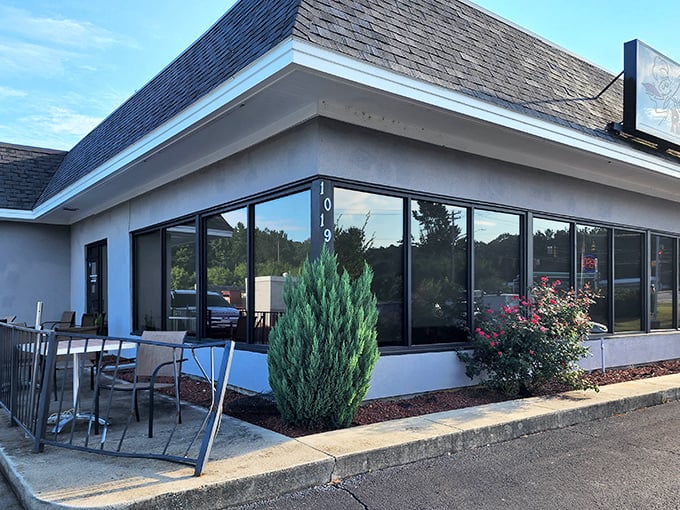 The restaurant's exterior is refreshingly honest – no pretension, just the promise of good food waiting inside those windows.