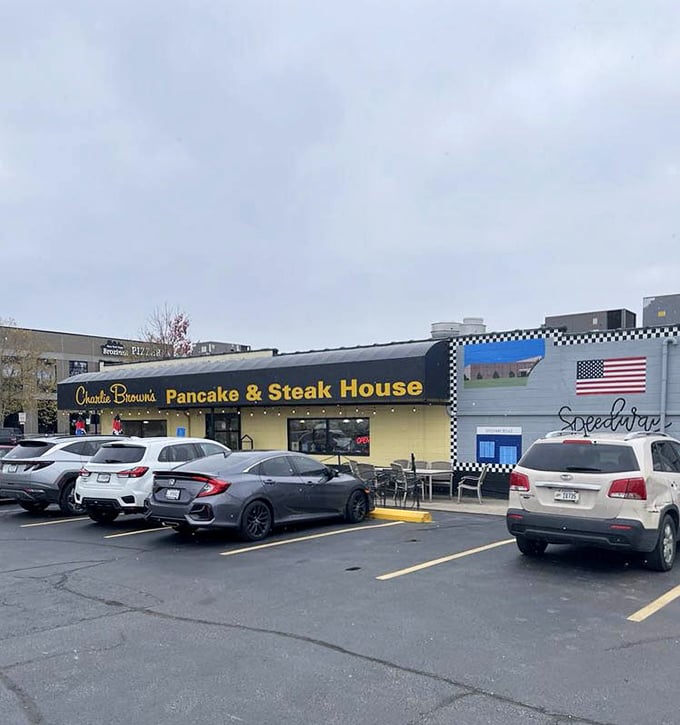 Even on cloudy days, Charlie Browns' exterior shines like a yellow beacon of breakfast hope in a sea of parking lot asphalt.