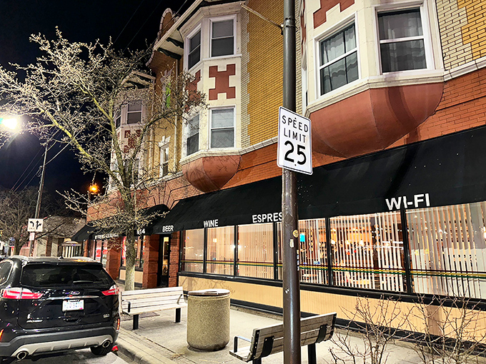 After dark, the restaurant's warm glow spills onto the sidewalk, a beacon for night owls and early birds alike.