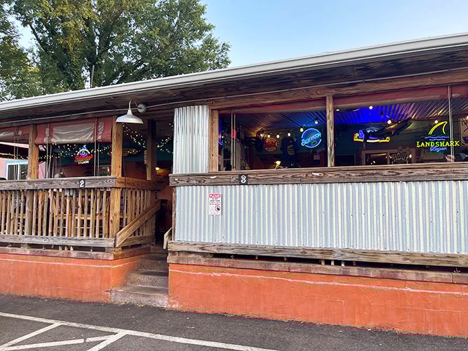 As evening falls, the patio's twinkling lights transform this humble fish house into the kind of place where summer memories are made.