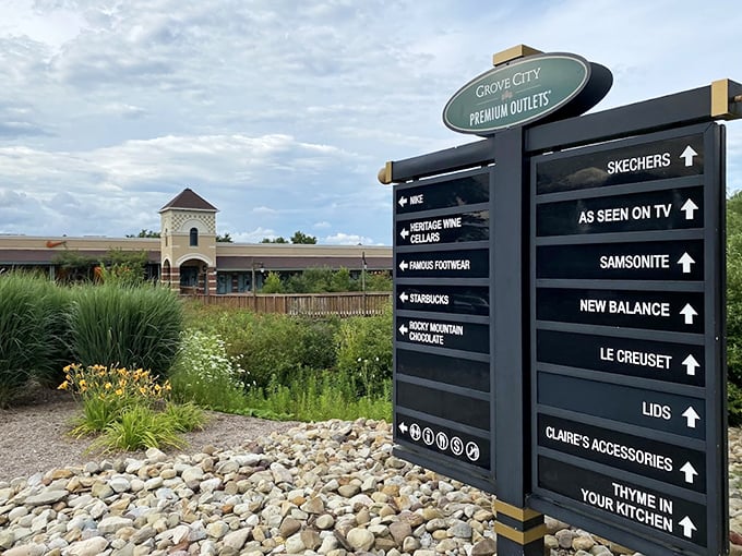 Navigation made stylish. This sign doesn't just point the way – it builds anticipation for the retail adventures that await around each corner.
