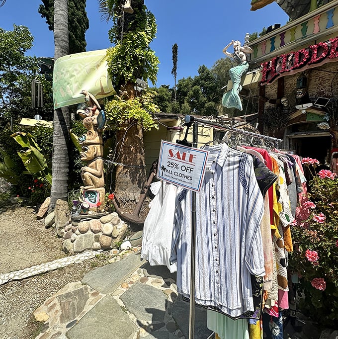 Outside, even the garden becomes retail space, with mermaid sculptures watching over racks of sale items in the California sunshine.