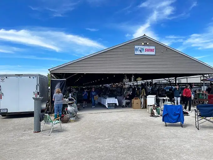 The "Swine" building transforms from livestock showcase to treasure trove, housing vendors and bargain hunters under one roof.