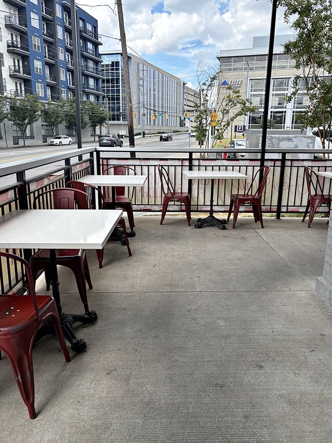 Urban oasis—where red metal chairs invite you to watch Nashville life unfold while nursing a chocolate malt and contemplating a second dessert.