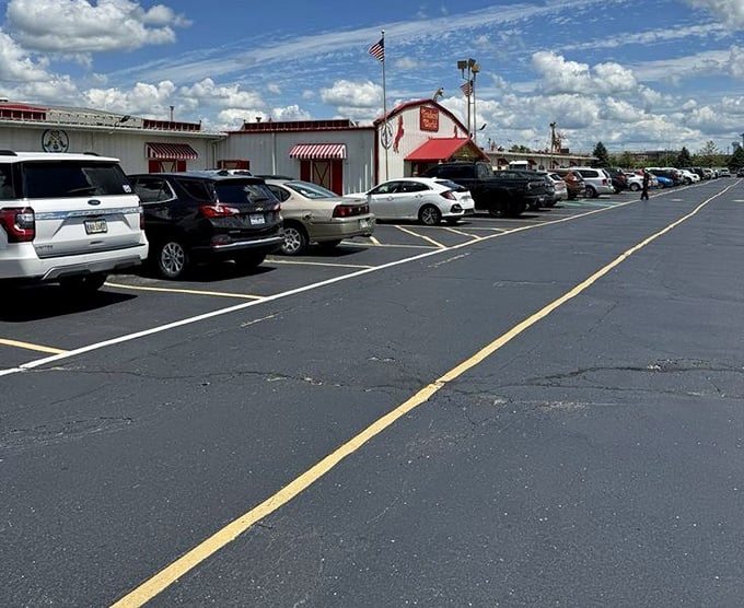 The parking lot tells the story—cars from counties near and far, each representing a family on a mission for deals.