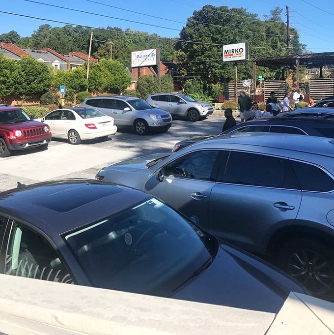 The packed parking lot tells the real story—these aren't just cars; they're evidence of a breakfast pilgrimage that locals deem absolutely necessary.