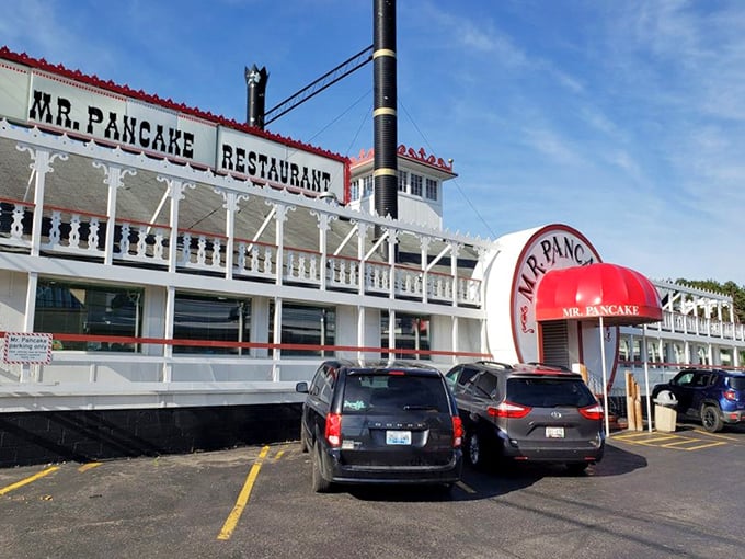 That sign isn't just announcing a restaurant—it's promising a Wisconsin institution where pancake dreams come true.