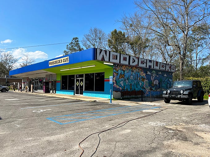 The full view reveals Woodchuck's true colors – a blue and green oasis of flavor standing proudly against Tallahassee's sky.