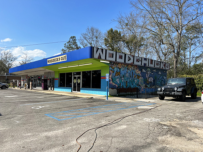 The full view reveals Woodchuck's true colors – a blue and green oasis of flavor standing proudly against Tallahassee's sky.
