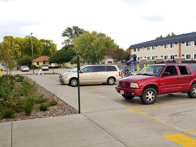 The spacious parking lot welcomes a steady stream of shoppers and donors, keeping the cycle of reuse and community support flowing.