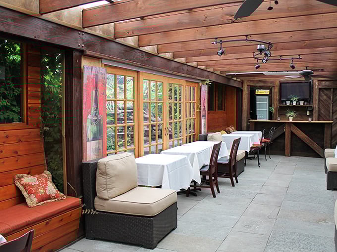 The patio offers al fresco dining with the comfort of indoors—like eating in a particularly well-appointed treehouse for grown-ups.