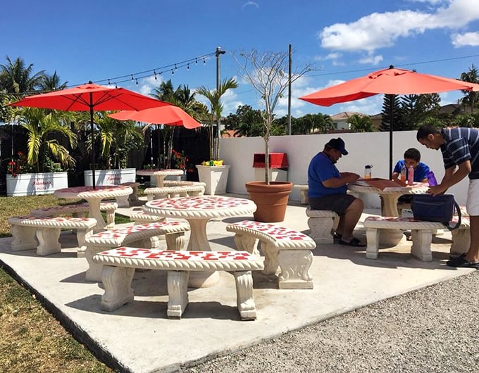 The outdoor patio offers a slice of Miami sunshine with your slice of heaven – those concrete tables have witnessed countless pizza epiphanies.
