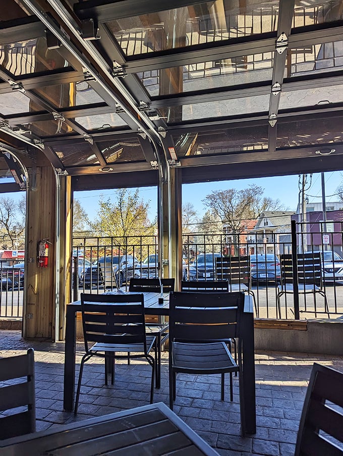 The garage-door patio brings the outdoors in—perfect for enjoying smoky meats while contemplating Kansas City's barbecue legacy.