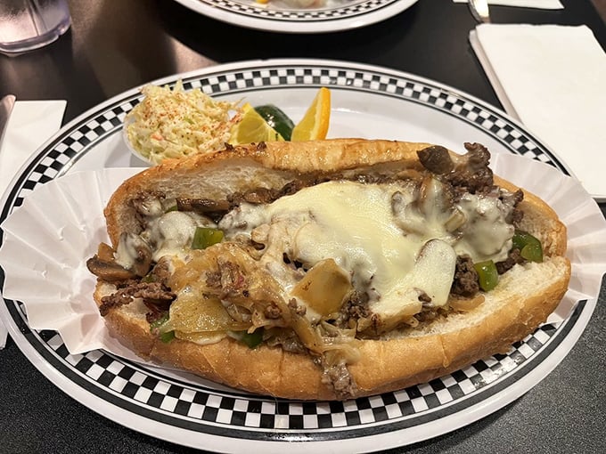 A Philly cheesesteak that's traveled south but kept its northern attitude—melty, messy, and magnificent in every way that matters.