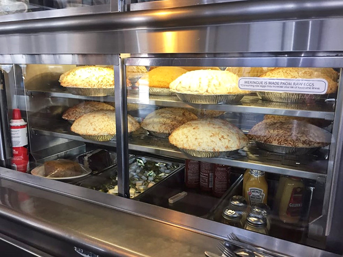The pie case—a display of edible treasures that makes choosing just one slice the hardest decision you'll make all day.